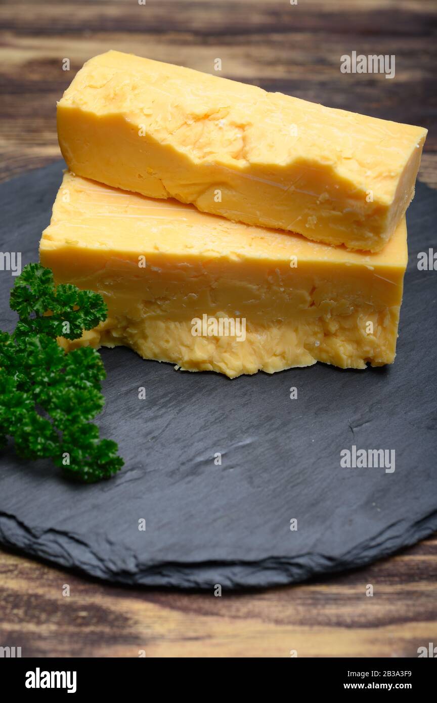 British hard cheese made from cow milk, yellow matured cheddar from ...