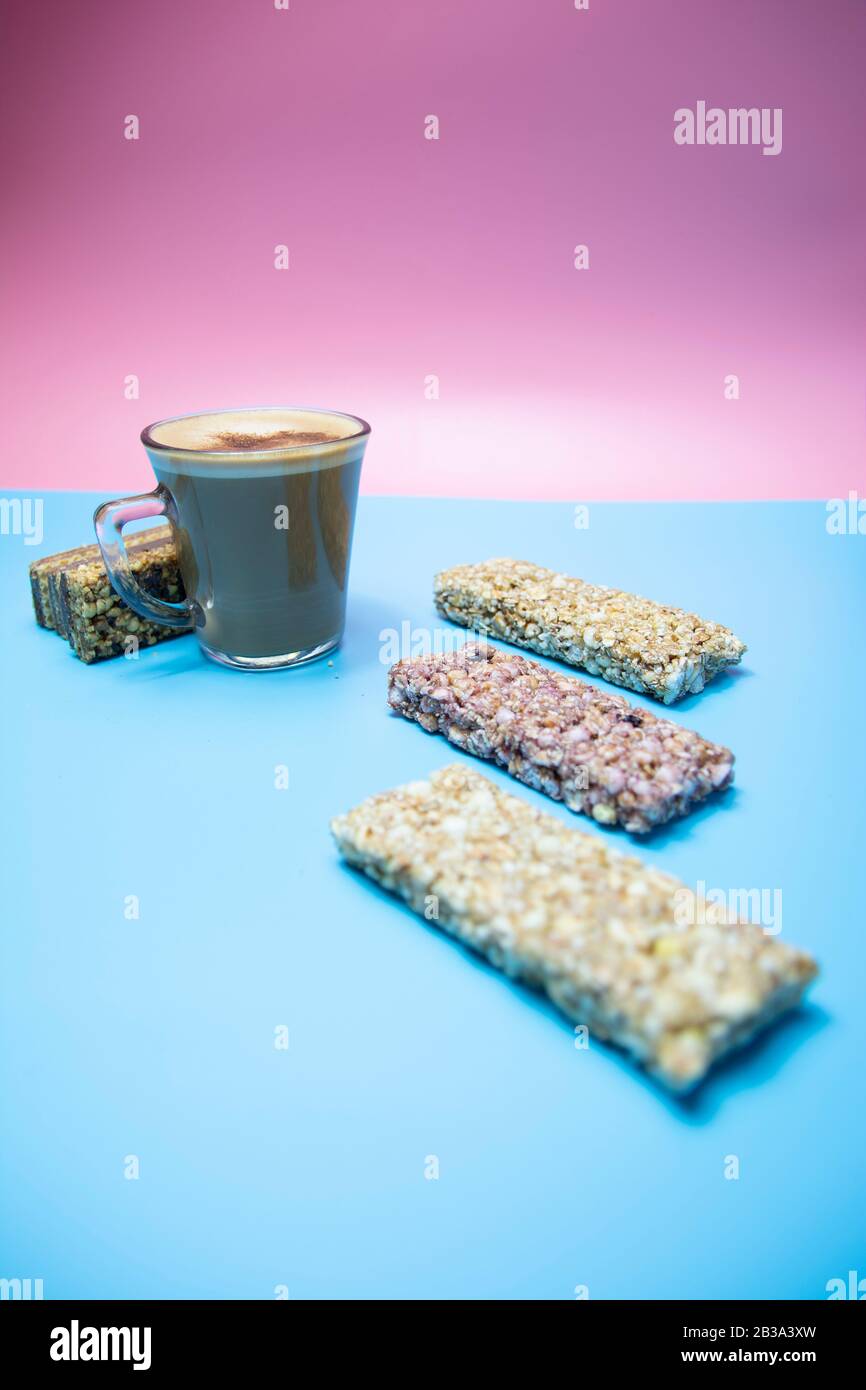 healthy nutrition protein bars on blue and pink background Stock Photo ...