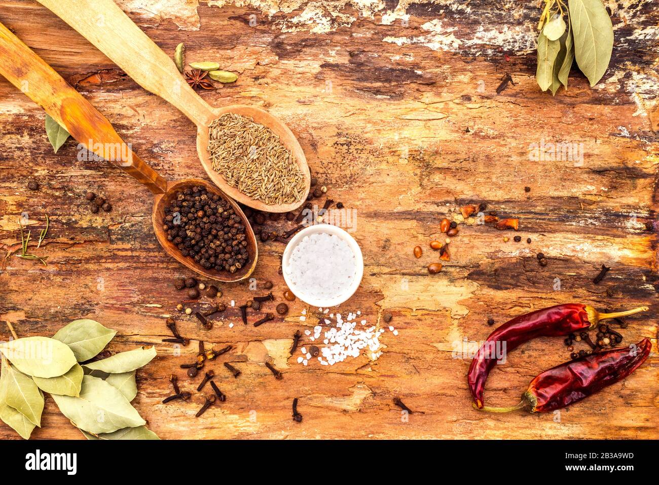 Set of different spices and herbs - black pepper, allspice, cumin, hot ...