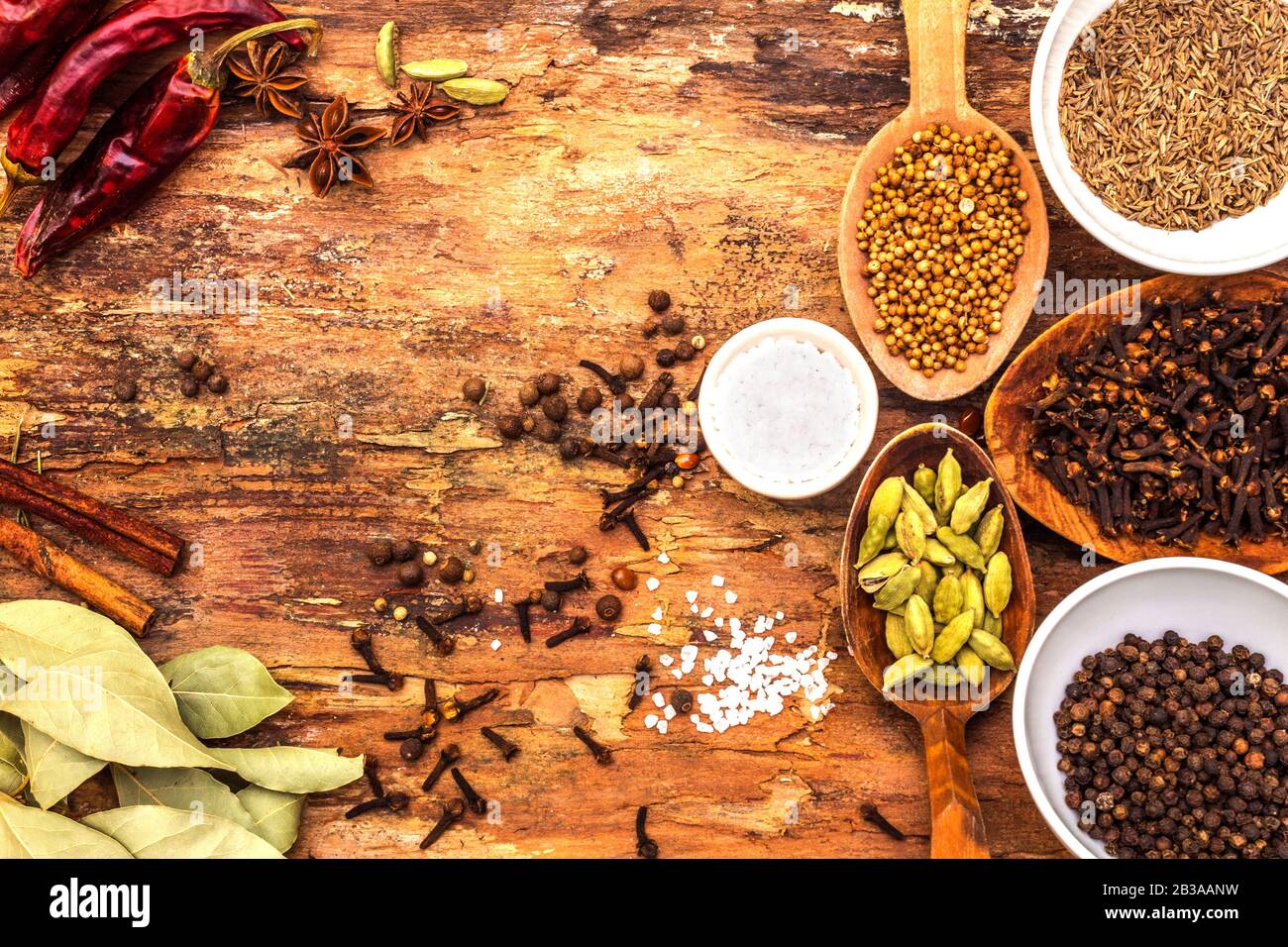 Set of different spices and herbs - black pepper, allspice, cumin, hot ...