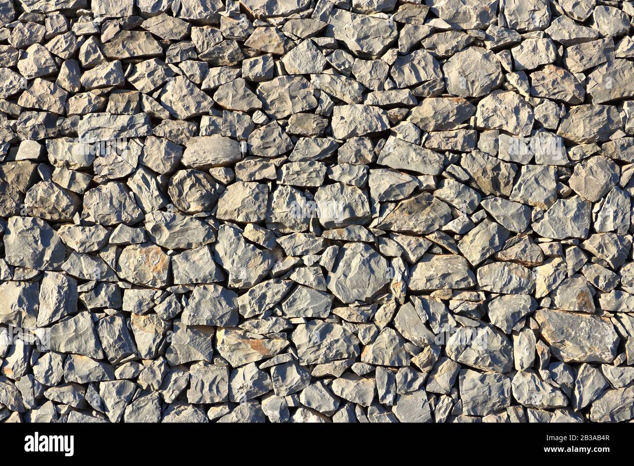 Texture of the grey granite stone wall for background Stock Photo - Alamy