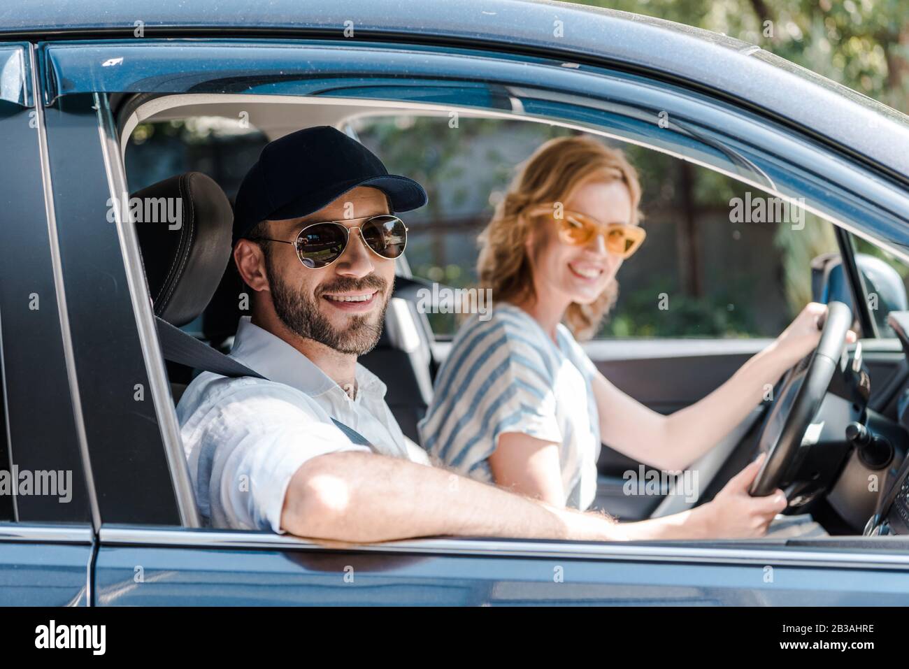 Woman happy driving sunshine hi-res stock photography and images - Alamy