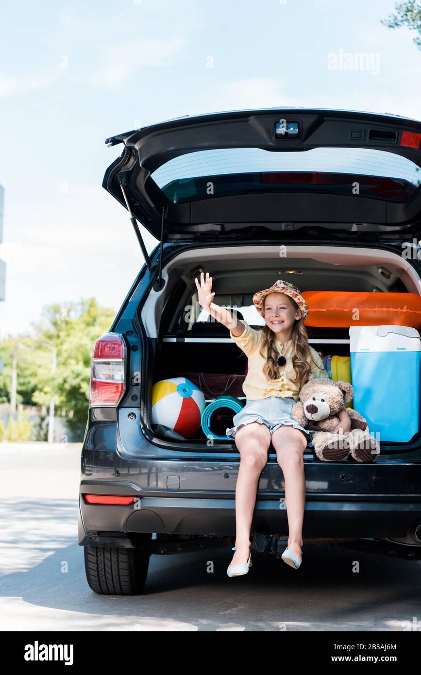 Kid waving at car hi-res stock photography and images - Alamy