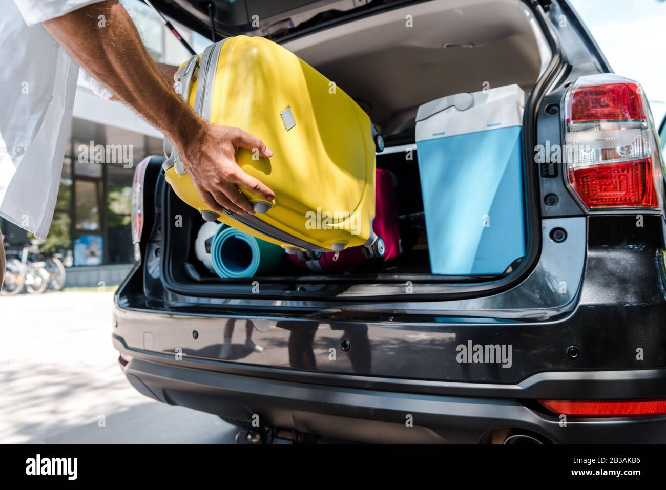 Putting in trunk hi-res stock photography and images - Alamy