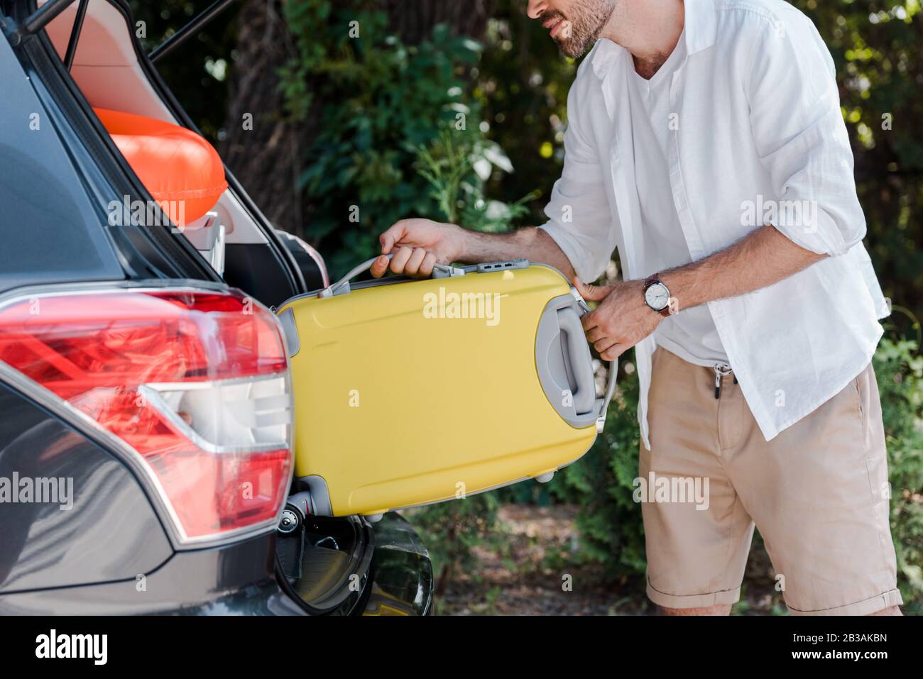 Putting in trunk hi-res stock photography and images - Alamy