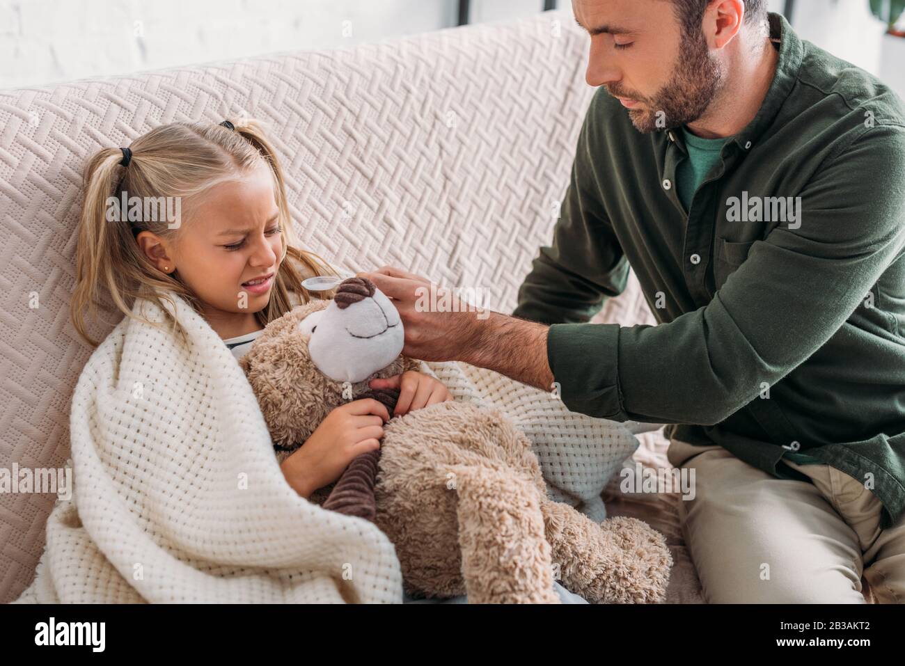 attentive father giving medicines to sick daughter Stock Photo - Alamy