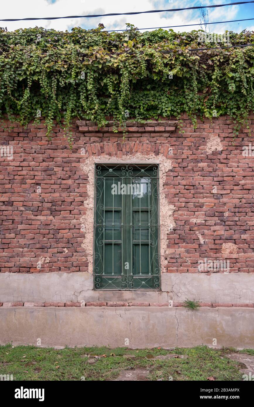 View of an old brick building with openings Stock Photo - Alamy