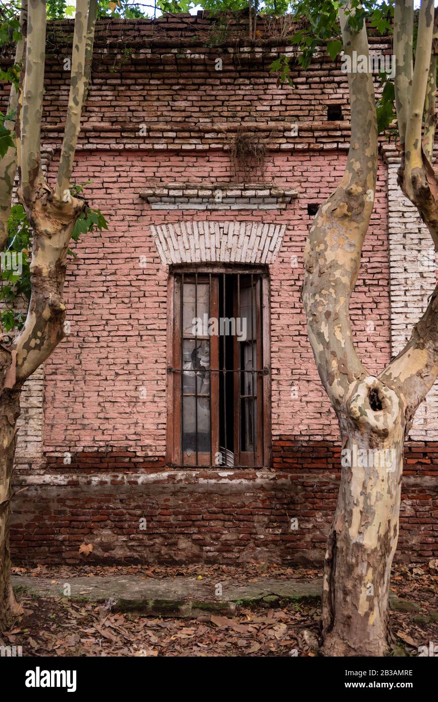 View of an old brick building with openings Stock Photo - Alamy