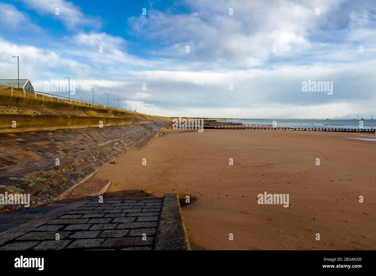View of Aberdeen Beach in Winter, its golden sand and its long curved ...