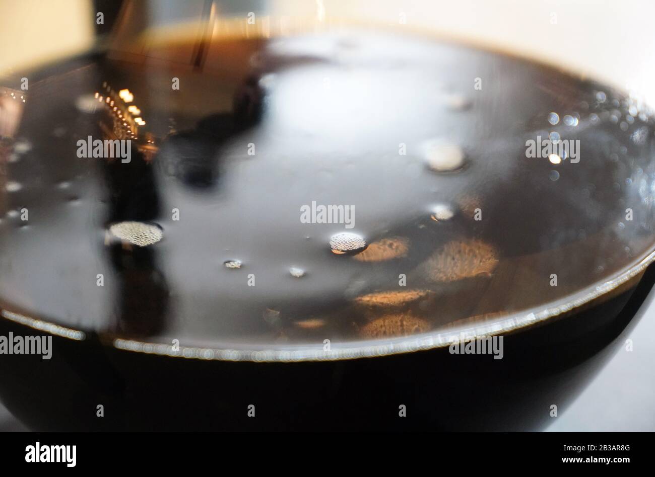 Image of coffee dripping in glass jar Stock Photo - Alamy