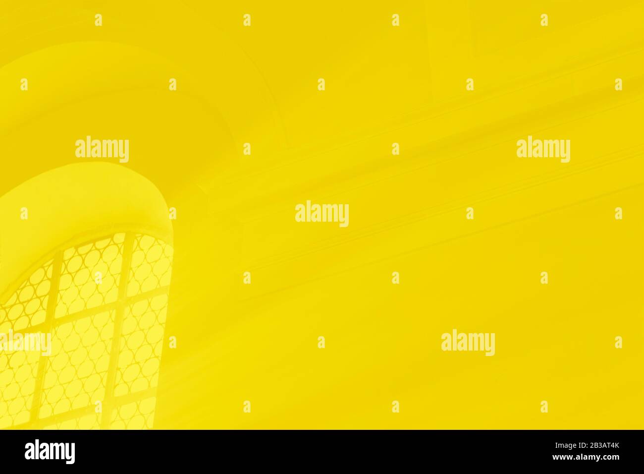 Light rays through the window. Yellow toned photo Stock Photo - Alamy