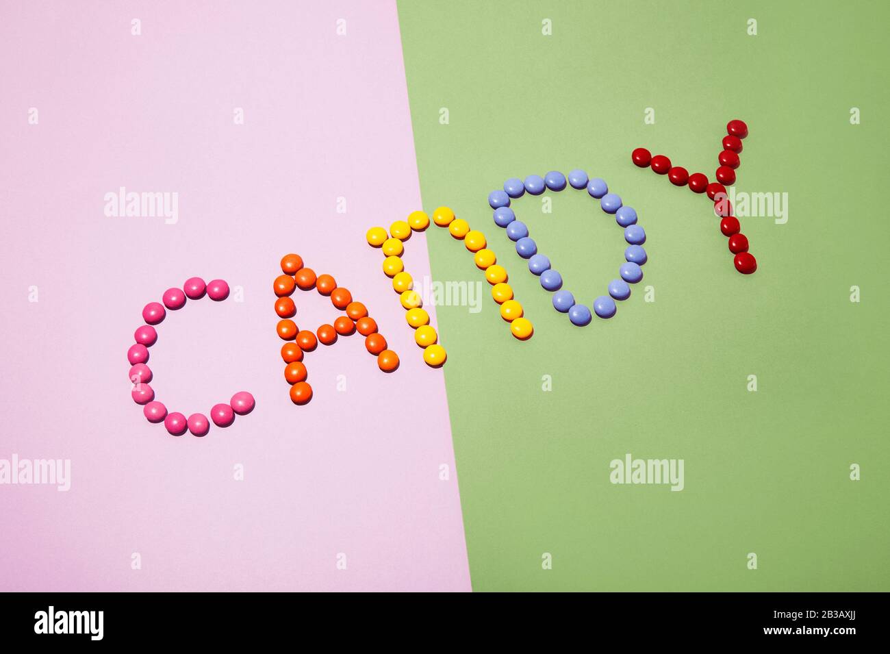Candy written in Colorful Candy Pieces Stock Photo - Alamy