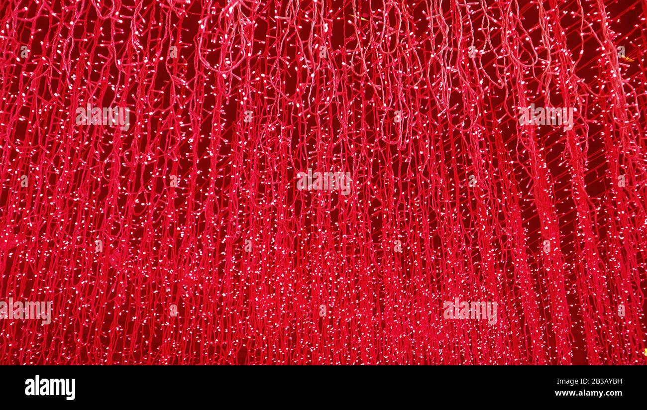 Vibrant Red Illuminated Ceiling String Lights for Background or Banner ...