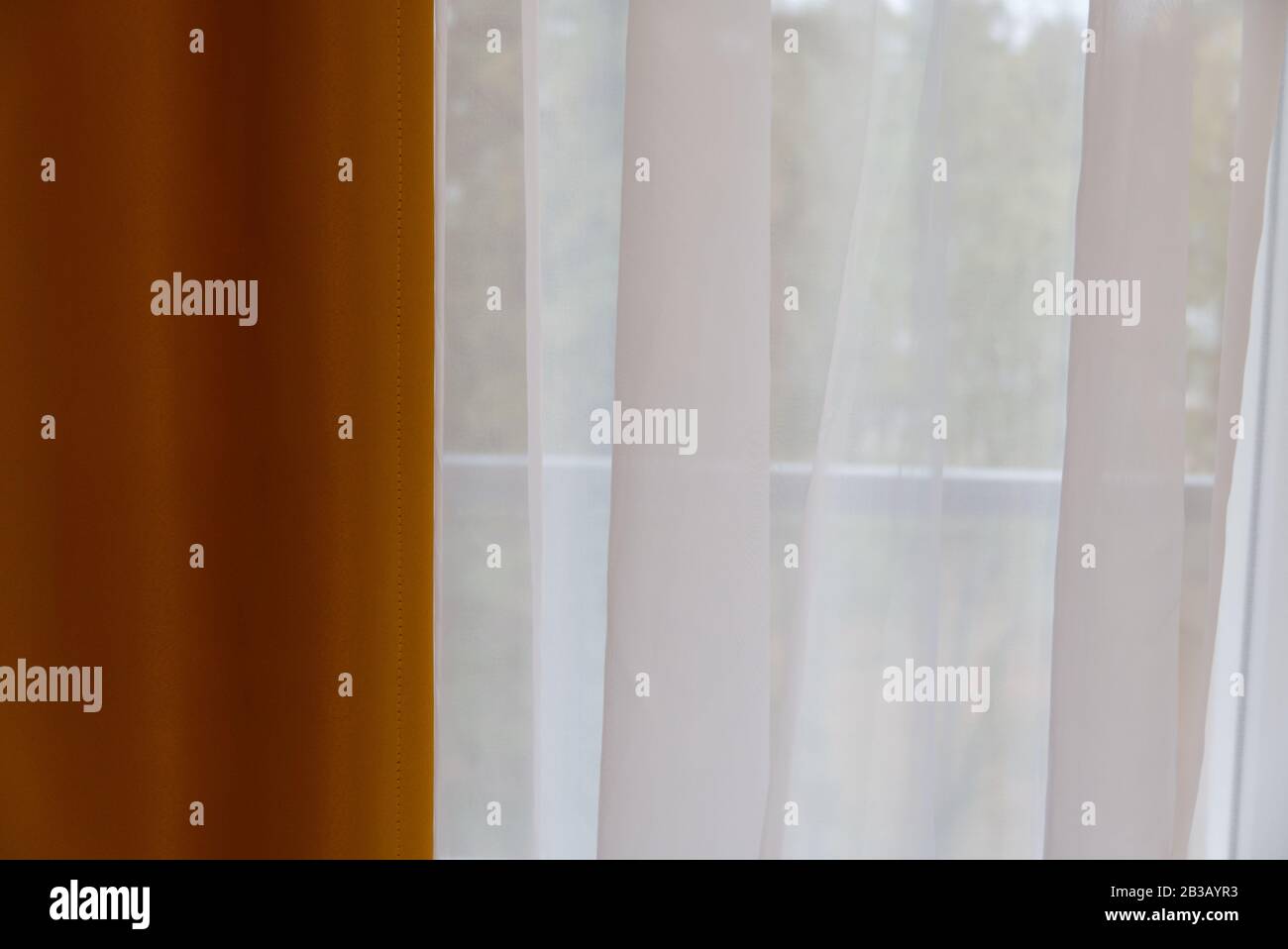 Window curtains, light tulle and a dark curtain from the sun. the ...