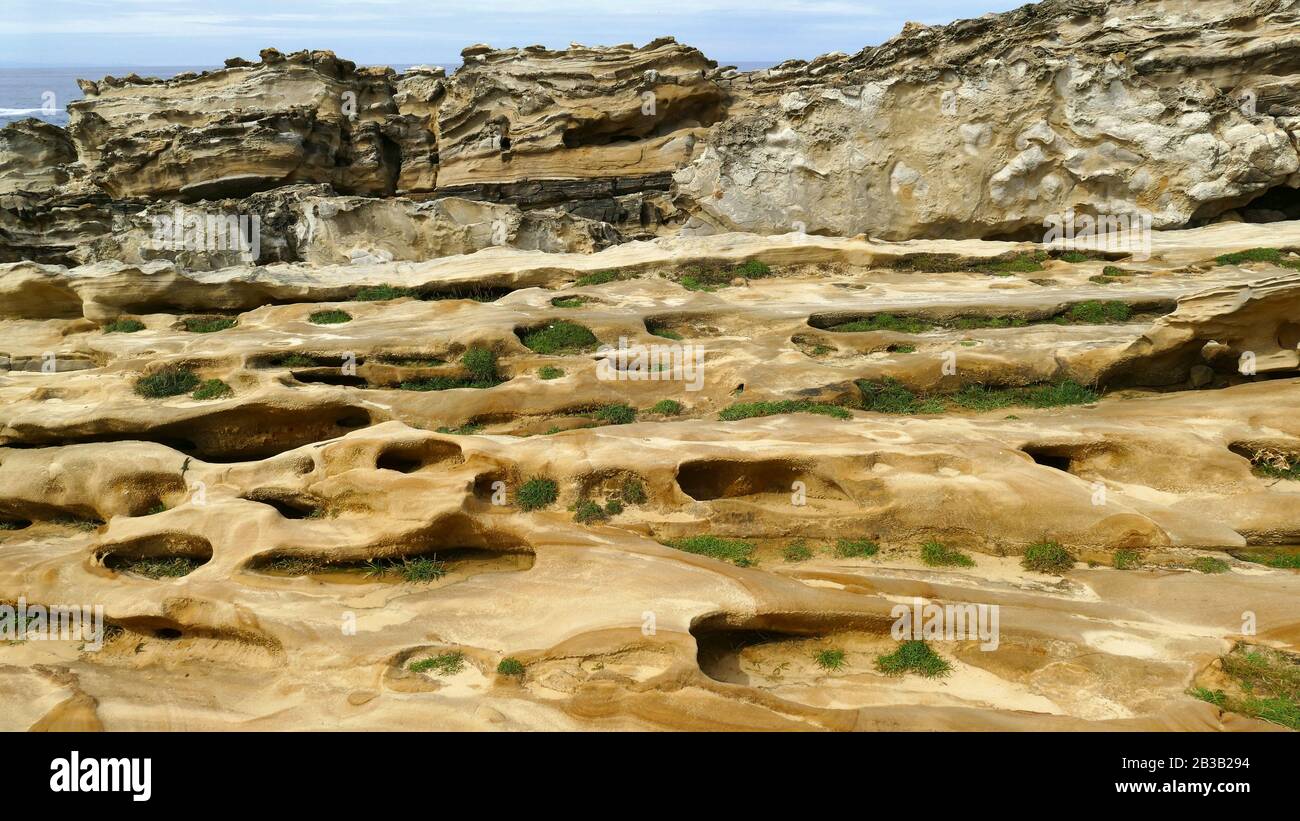Rocks and limestone eroded on the coast of the sea Stock Photo - Alamy