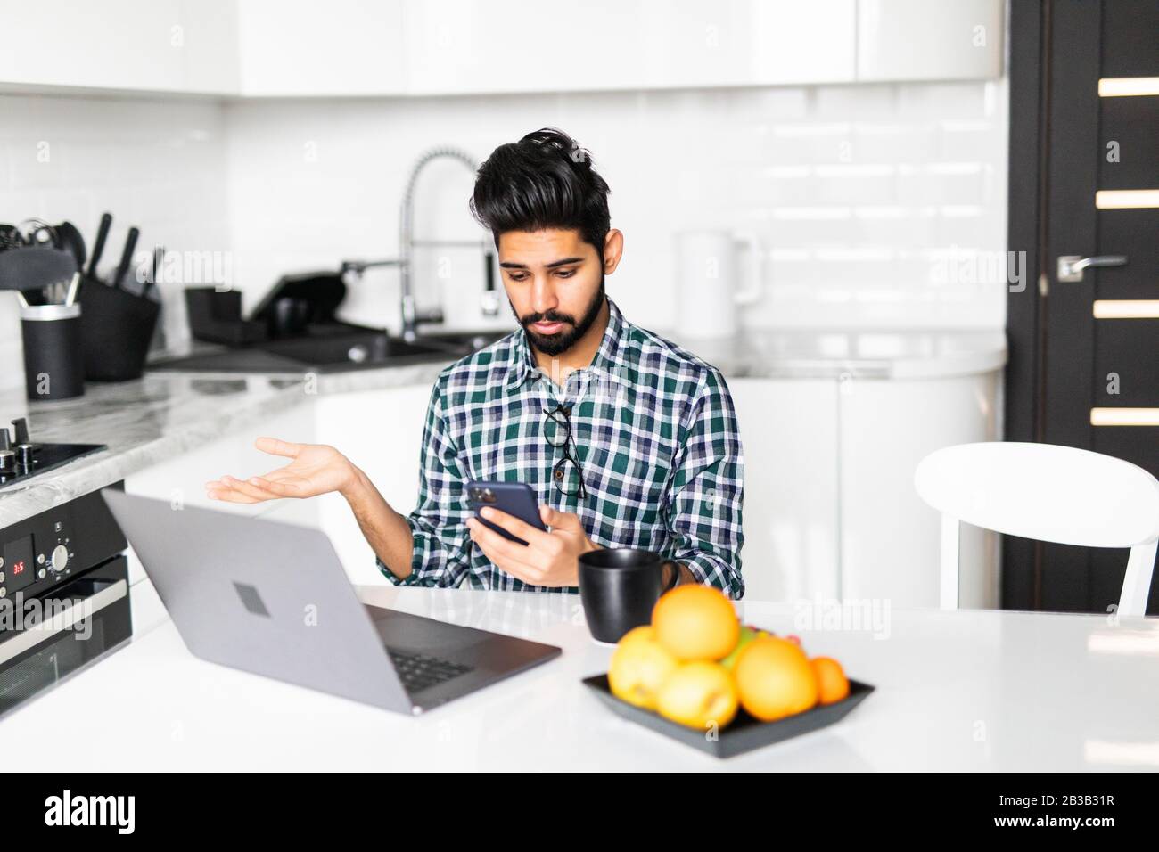 Indian confused businessman hi-res stock photography and images - Alamy