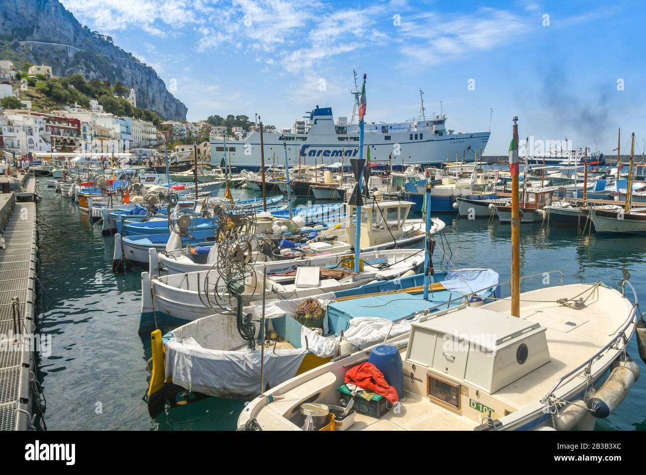 ISLE OF CAPRI, ITALY - AUGUST 2019: Small fishing boats in the harbour ...