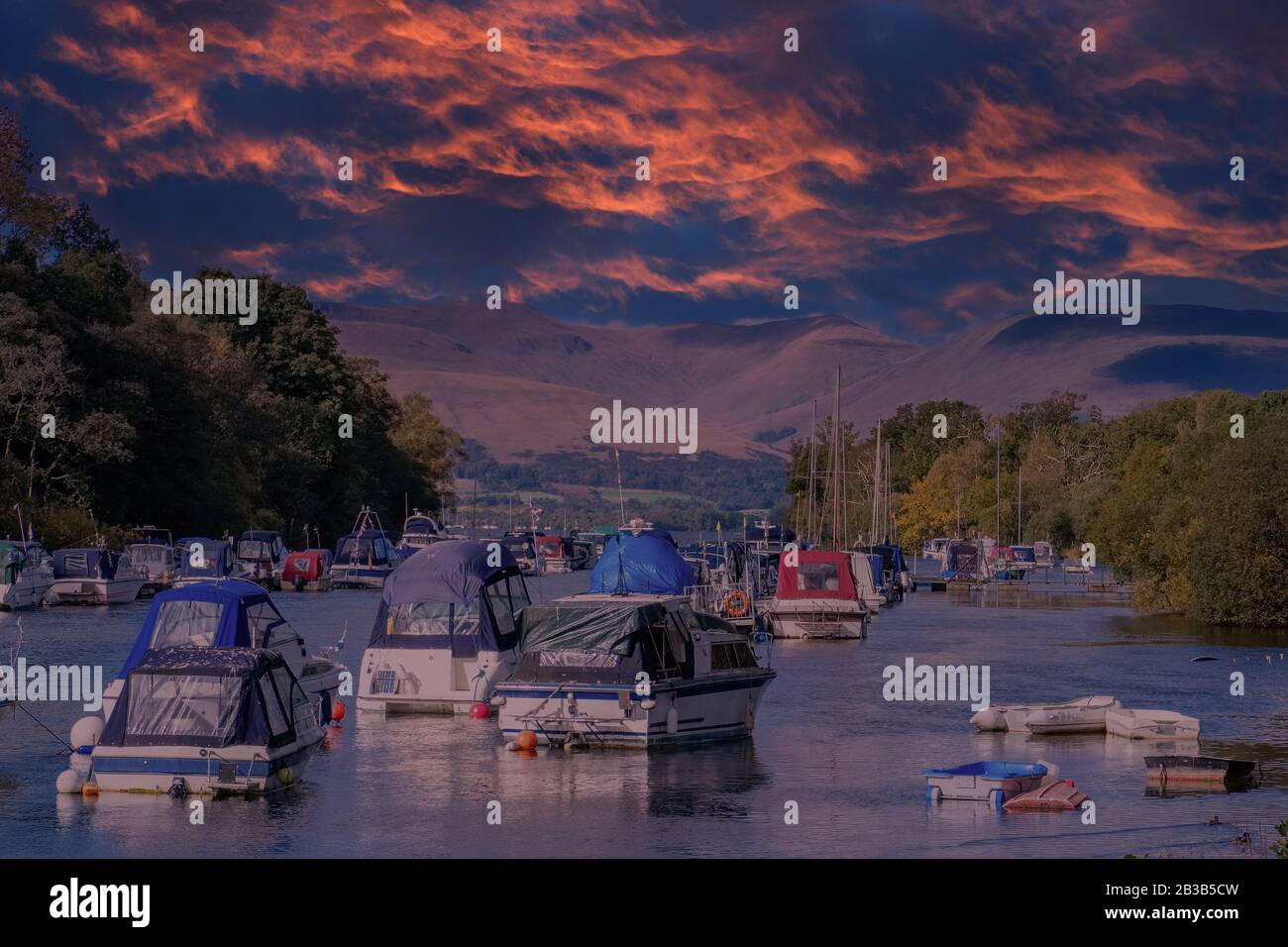 Small Pleasure Craft at the bottom of Loch Lomond in Balloch as the sun ...