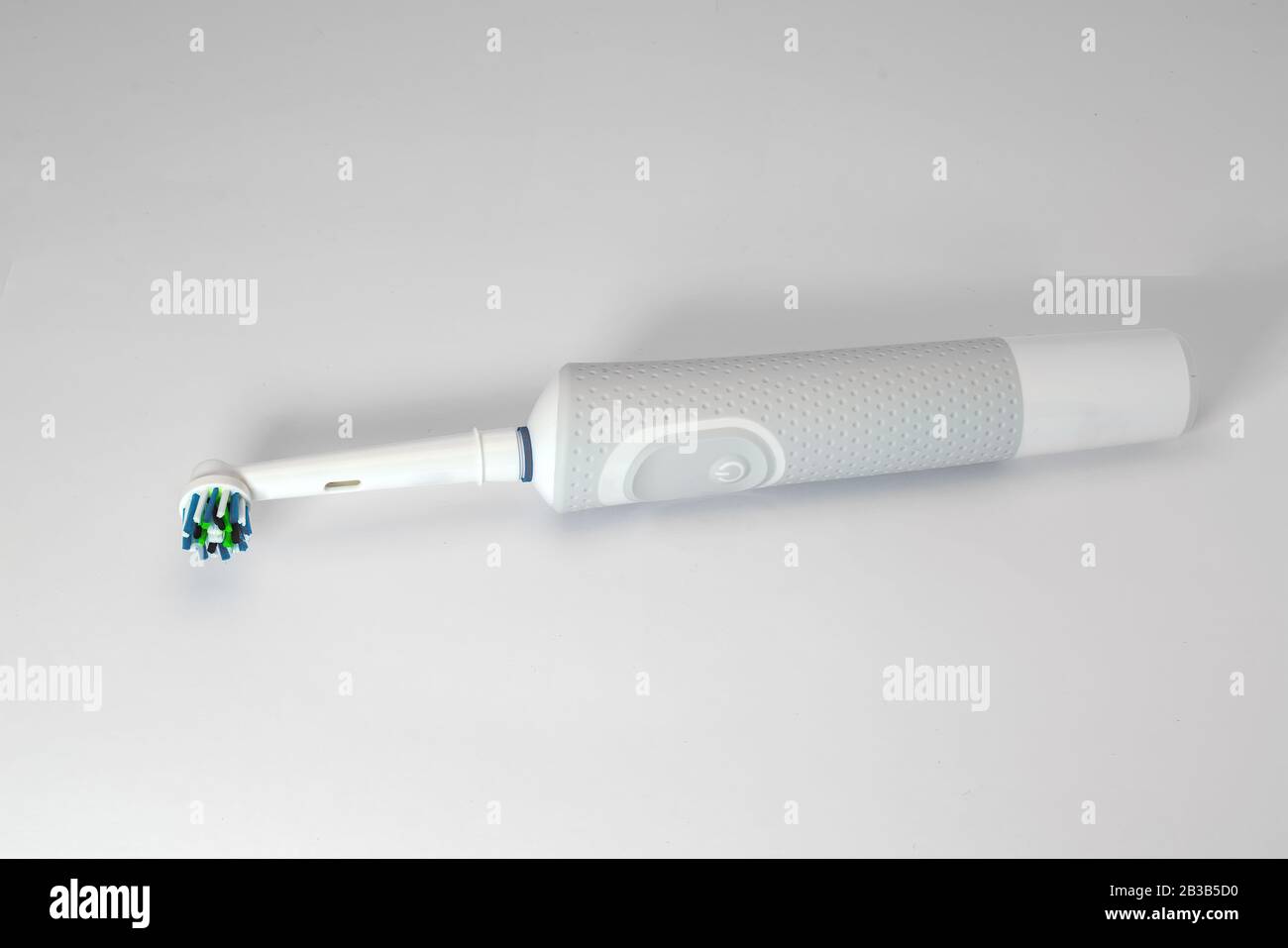 Electric toothbrush isolated on a white background Stock Photo - Alamy