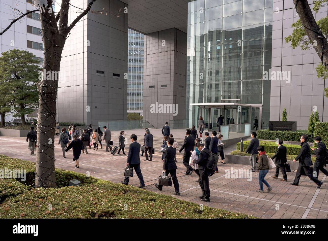 Japan suits crowd hi-res stock photography and images - Alamy