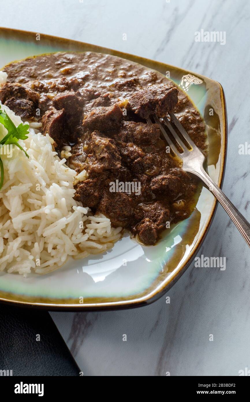 Indian boti liver curry made with chicken offal giblets with basmati ...