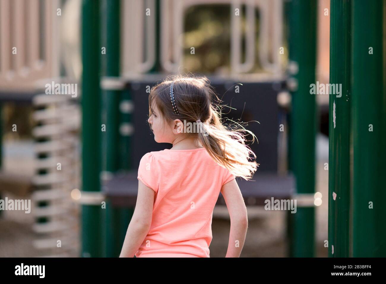 Sisters are playing and using teamwork on the playground Stock Photo ...