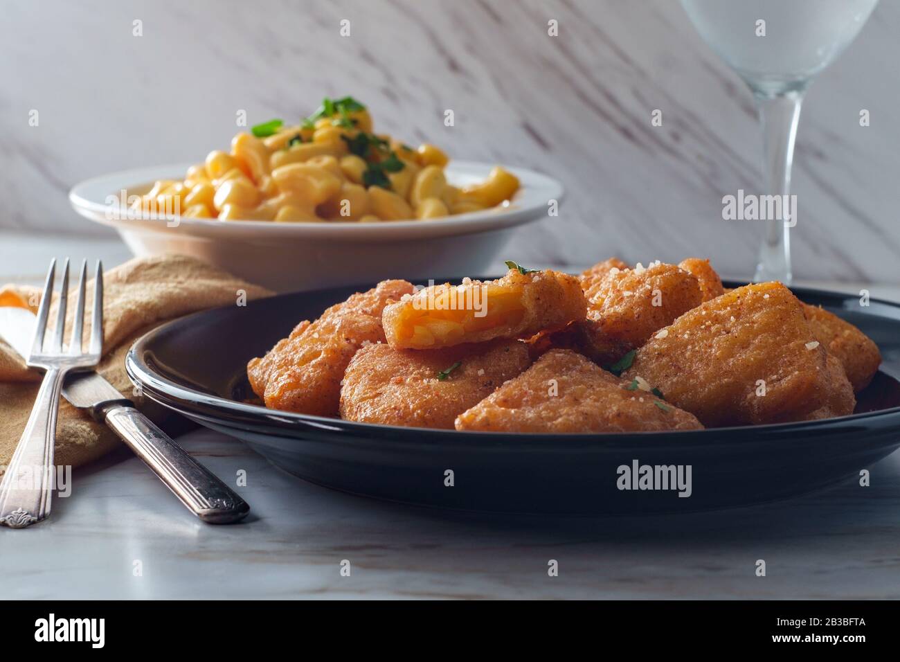 Deep fried cheddar cheese bites hi-res stock photography and images - Alamy