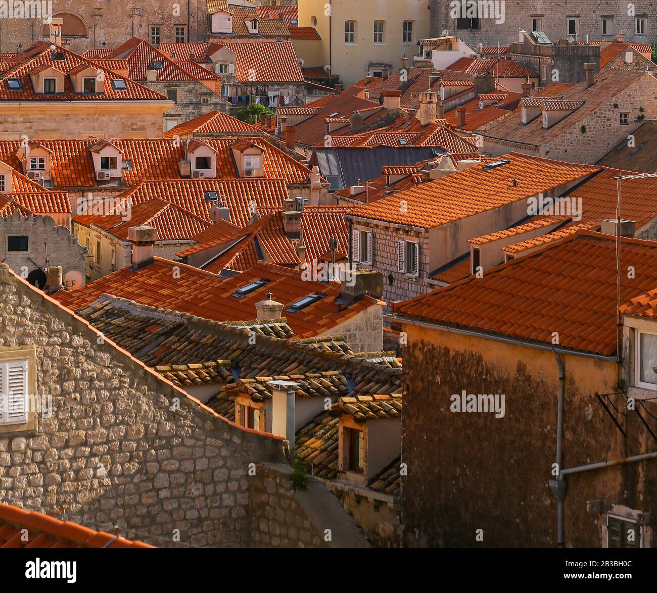 The colourful red pantiles of the roofs of the buildings in The Old ...