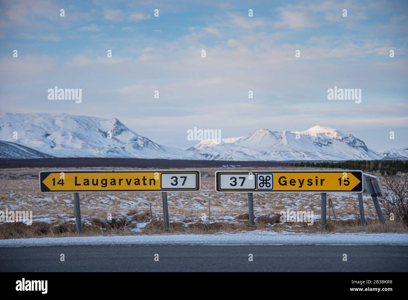 Icelandic road with yellow travel signs Stock Photo - Alamy