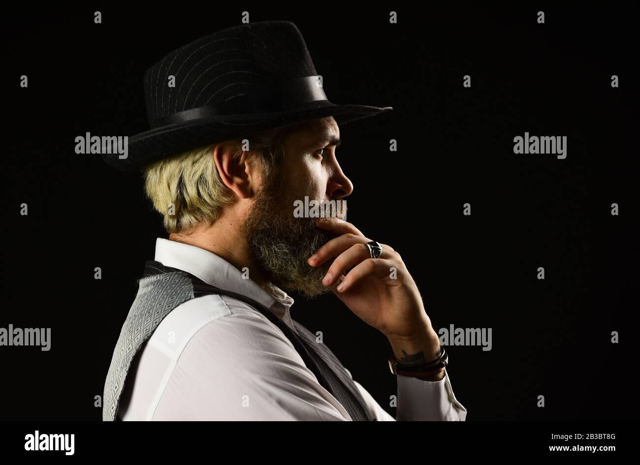 brutal bearded hipster in suit vest. mafia gentlemen club. mature ...