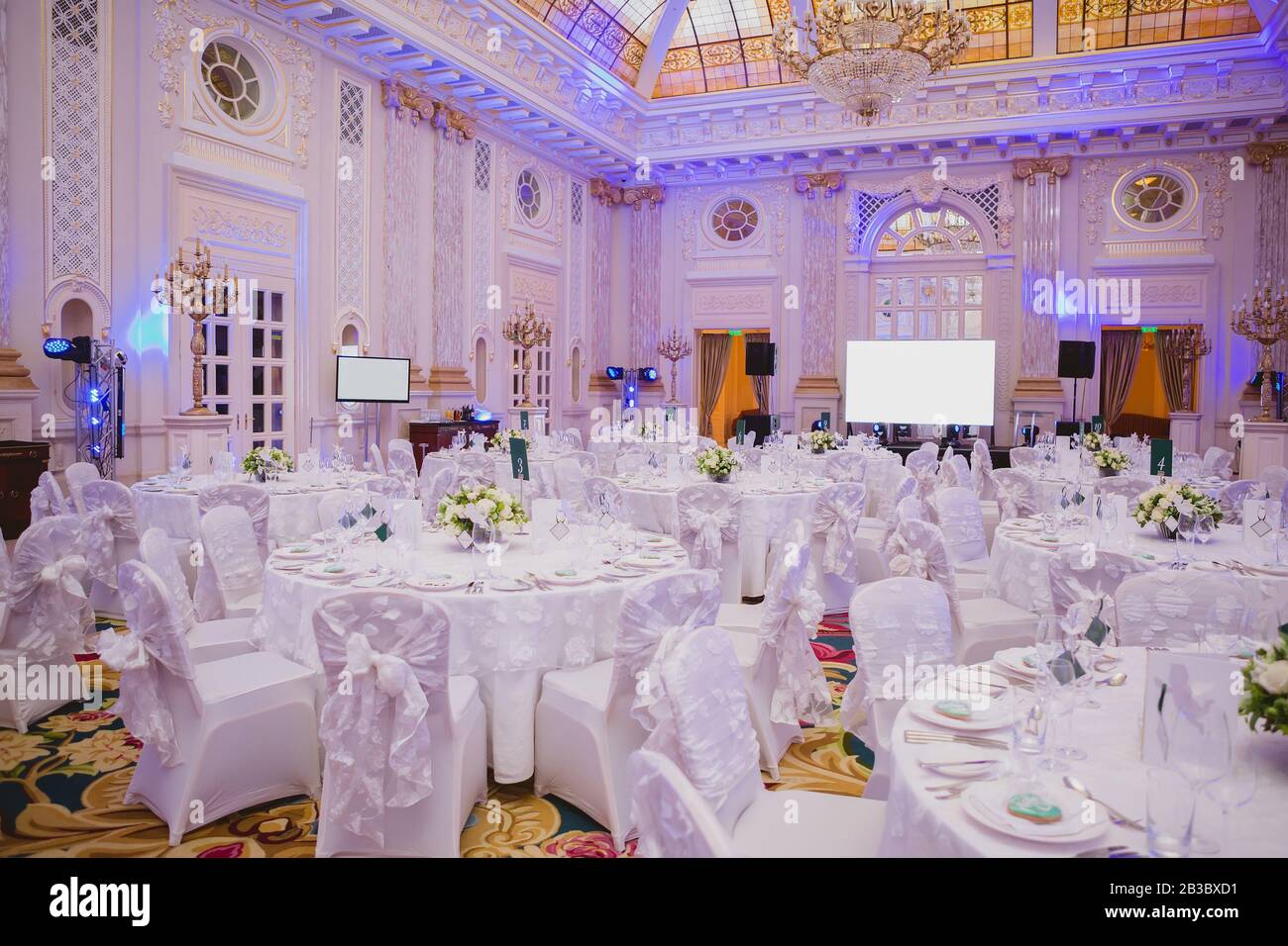 image of tables setting at wedding hall Stock Photo - Alamy