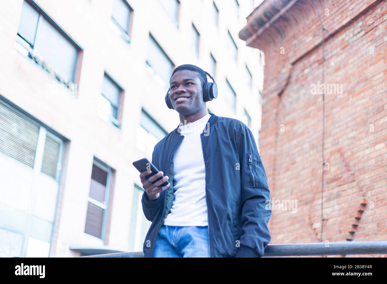 African Young Man Listening Music Stock Photo - Alamy