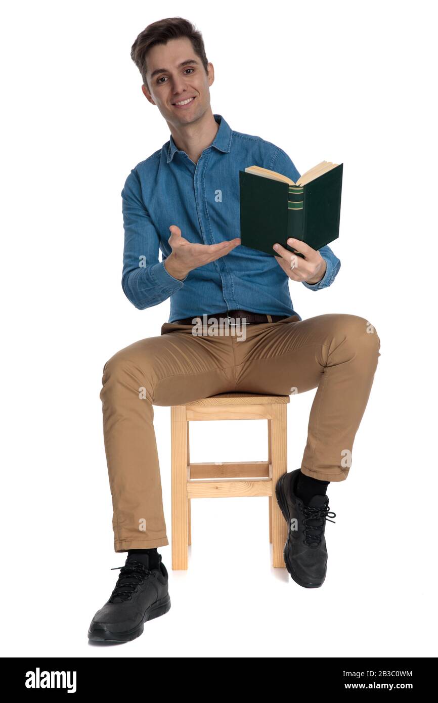 Smiling handsome man recommending Cut Out Stock Images & Pictures - Alamy