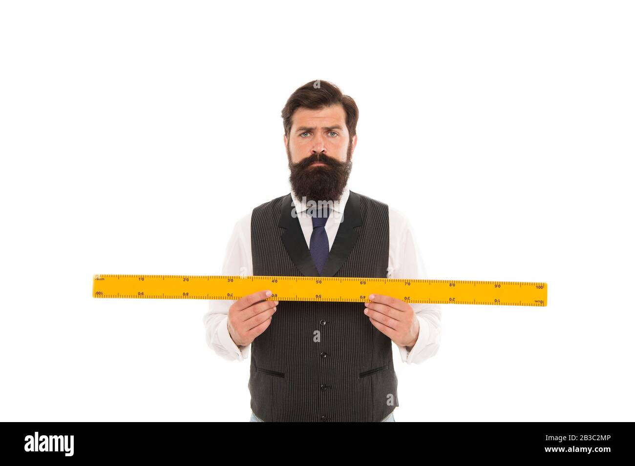 Measuring a line. back to school. bearded man hold ruler isolated on ...