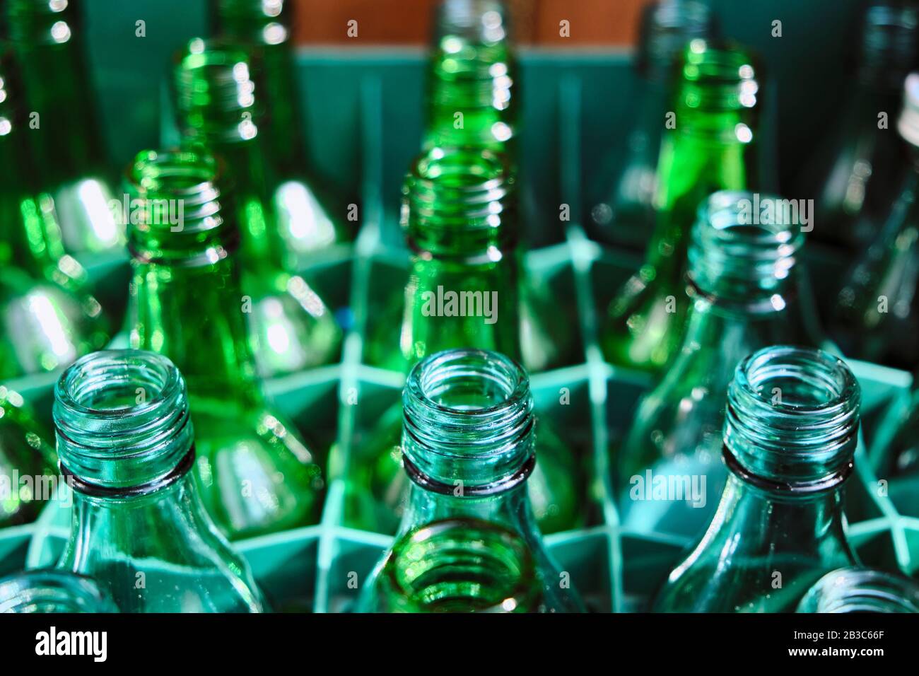 A shot of empy glass bottles ready to be recycled Stock Photo - Alamy