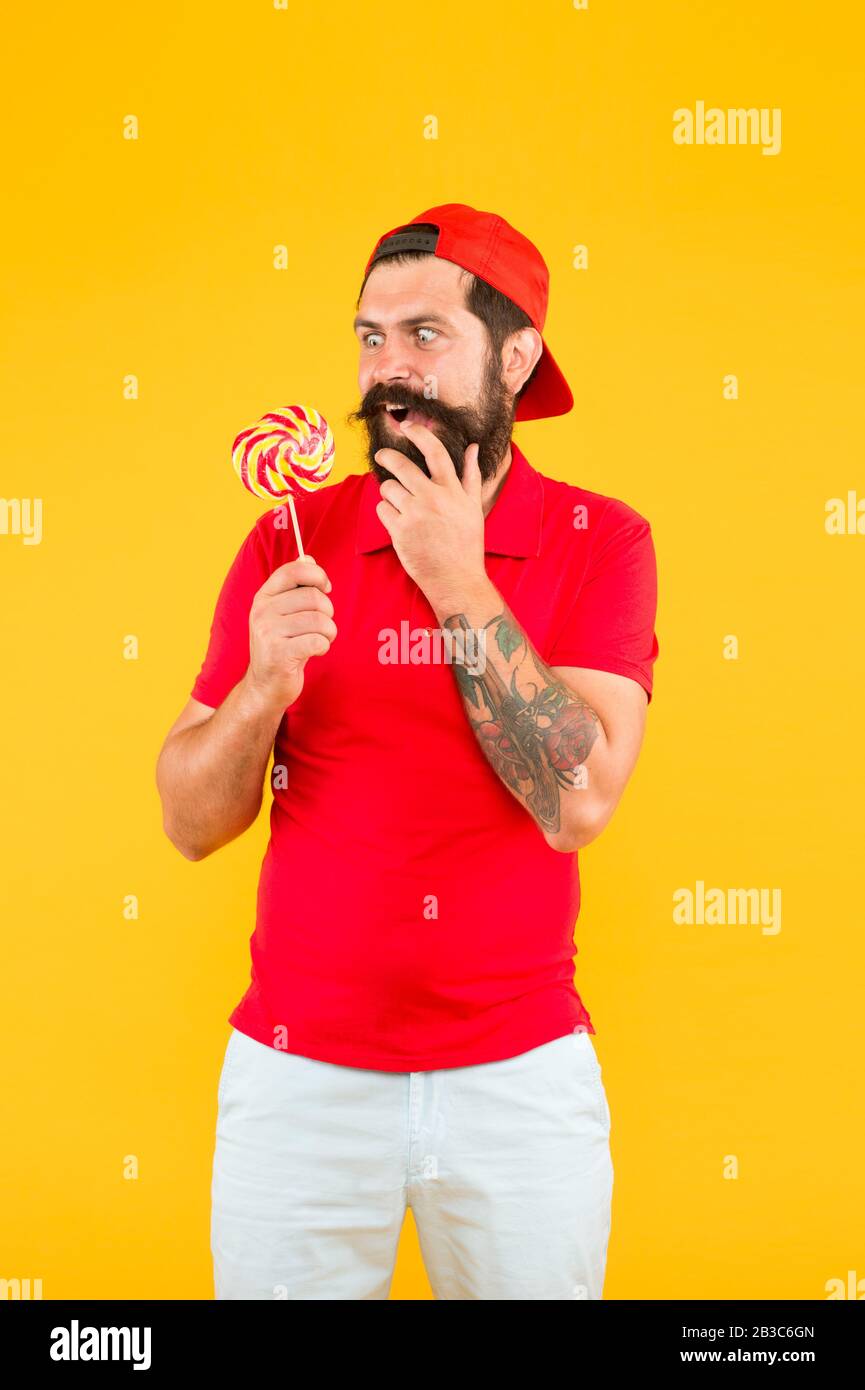 wow. Sweet boy. Taste of childhood. Happy eating sweets. Man eat ...