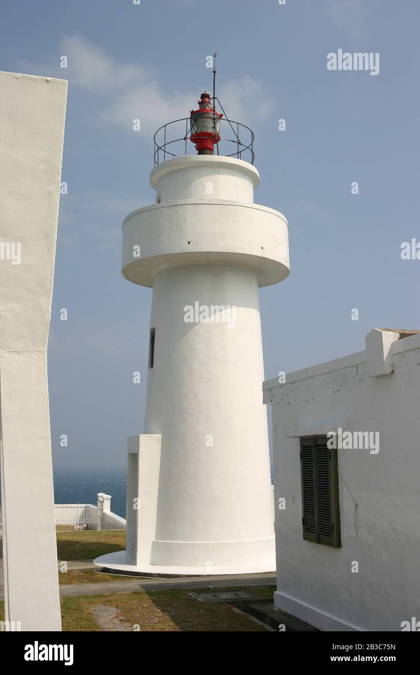 Sunny view of the beautiful Bitoujiao Lighthouse at New Taipei City ...