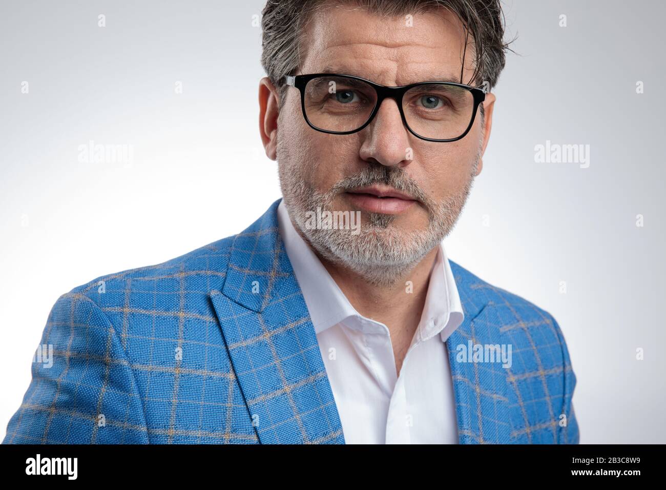 close up of a good looking formal business man wearing a light blue ...