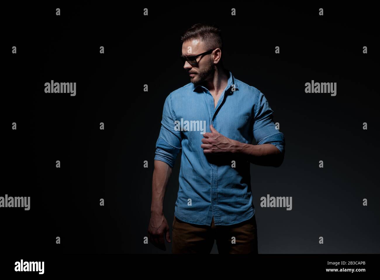 Fixing shirt hi-res stock photography and images - Alamy