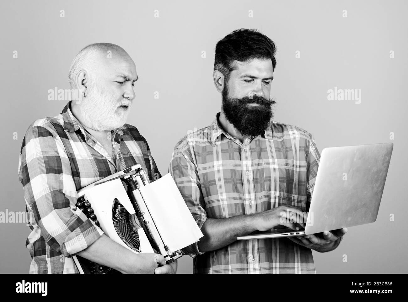 Master new technologies. Modern life and remnants of past. Men work ...