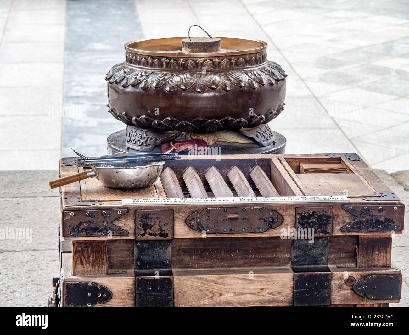 Incense burner and box for coins at entrance to Shinto Shrine Stock ...