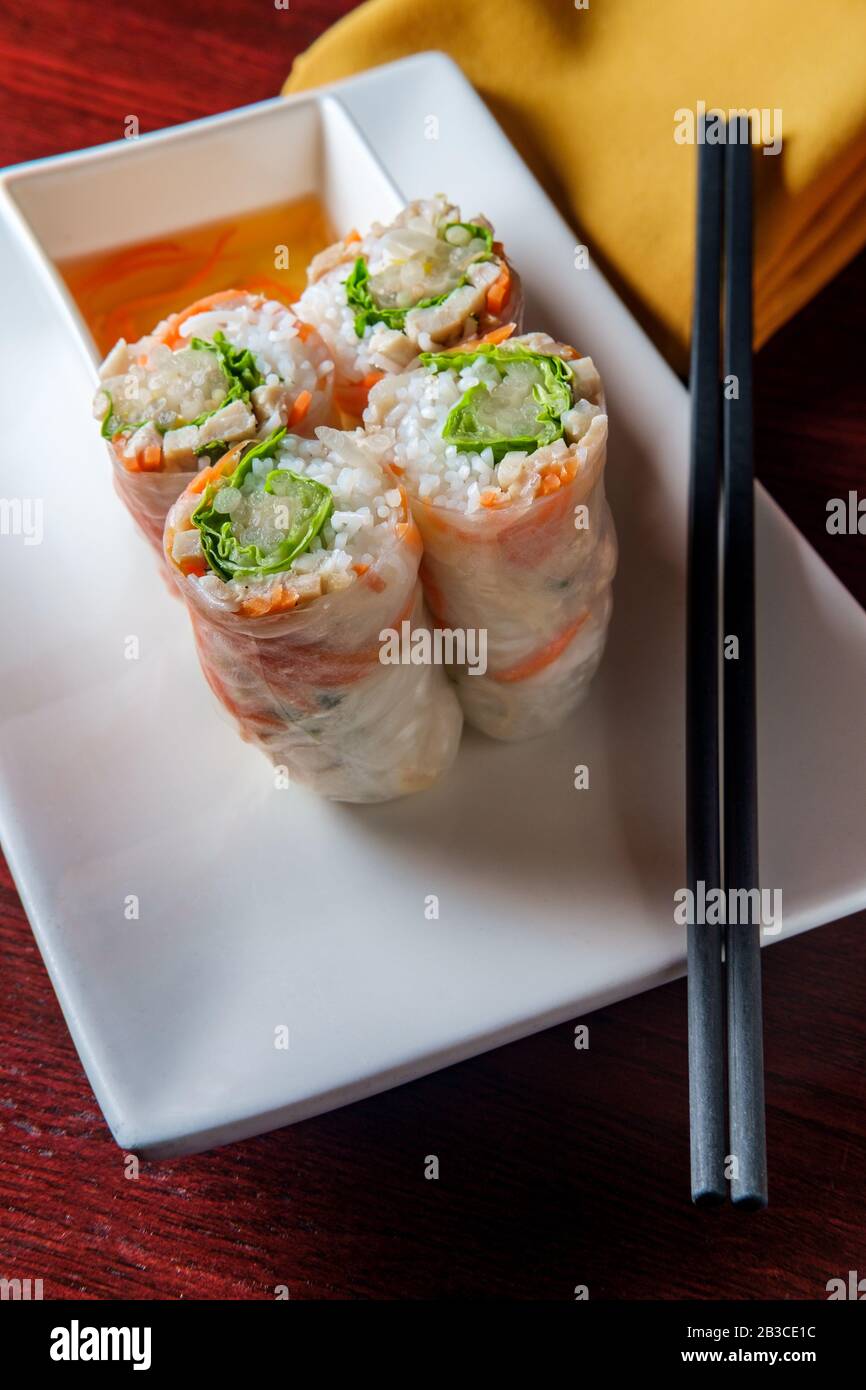 Fresh sliced vietnamese vegetable spring rolls with chicken and sweet ...
