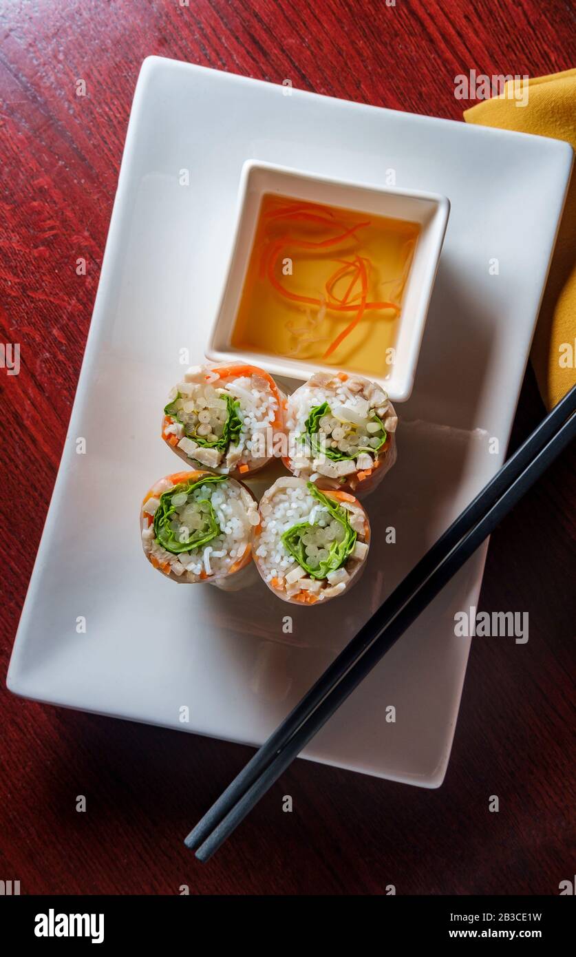 Fresh sliced vietnamese vegetable spring rolls with chicken and sweet ...