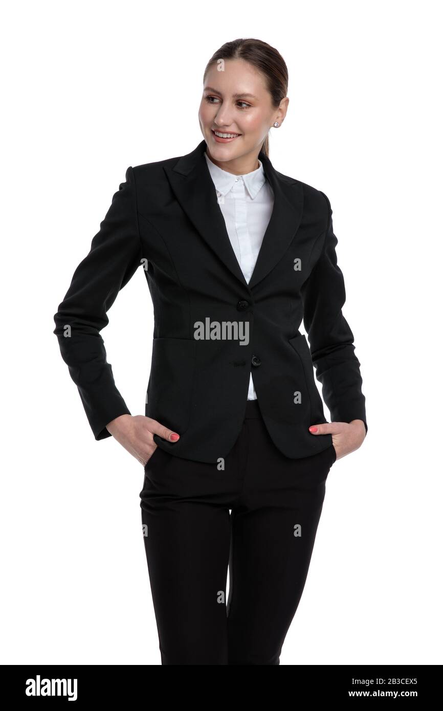 good looking formal businesswoman wearing black suit standing with ...
