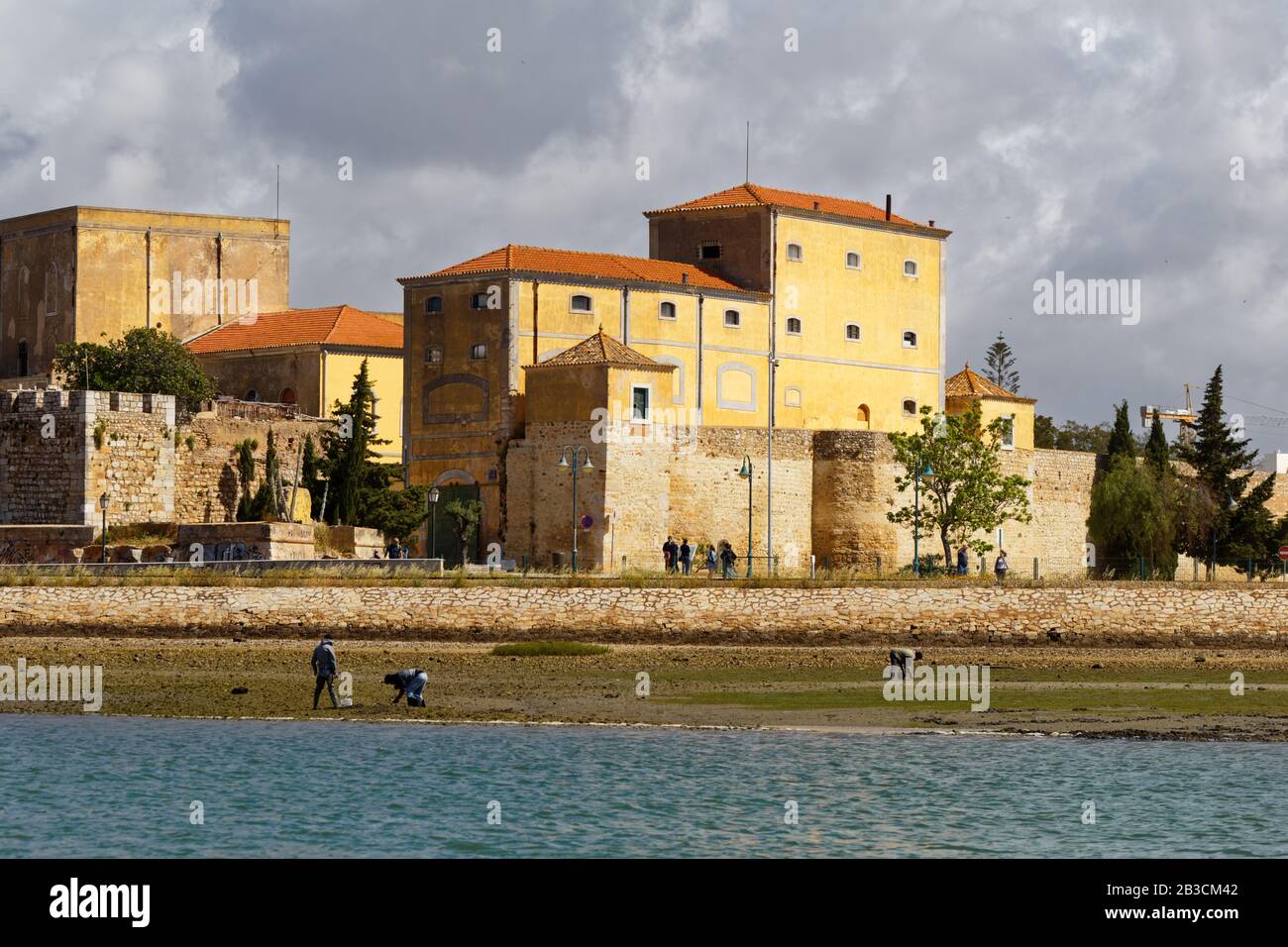 City walls of Faro, Portugal viewed from Ria Formosa lagoon Stock Photo ...