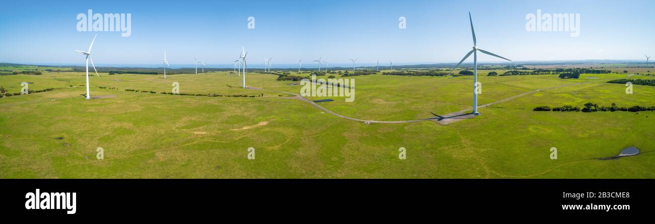 Wind farm and green grasslands in the summer - aerial panorama Stock ...