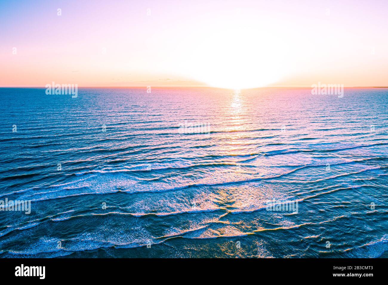 Bright sunset over sea - minimalist aerial seascape Stock Photo - Alamy