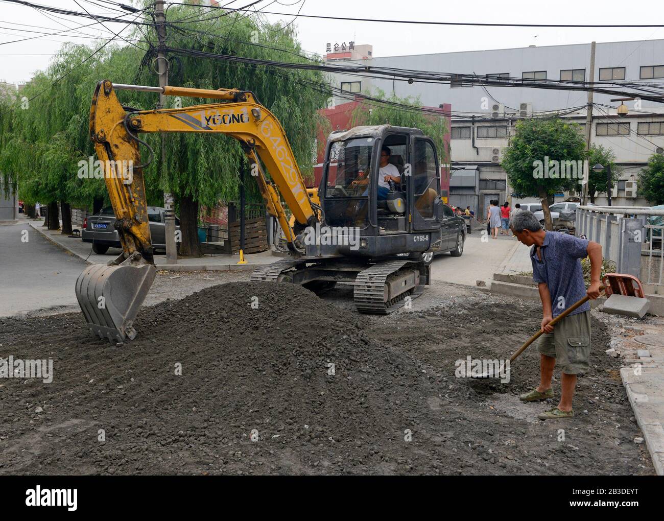 Leveling a road surface in preparation for tarmac, Beijing, China Stock ...