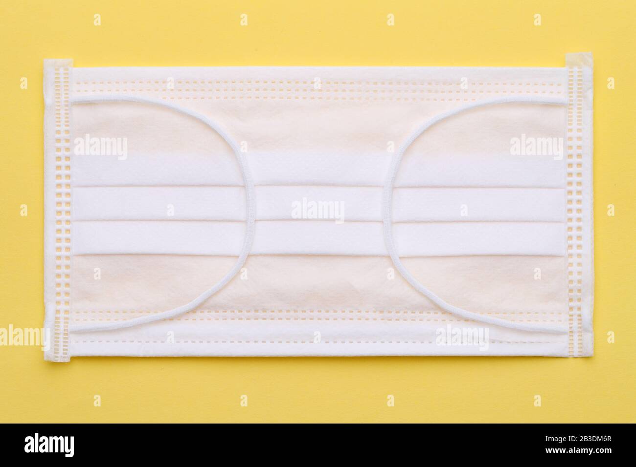 white protection face mask on the color background Stock Photo - Alamy