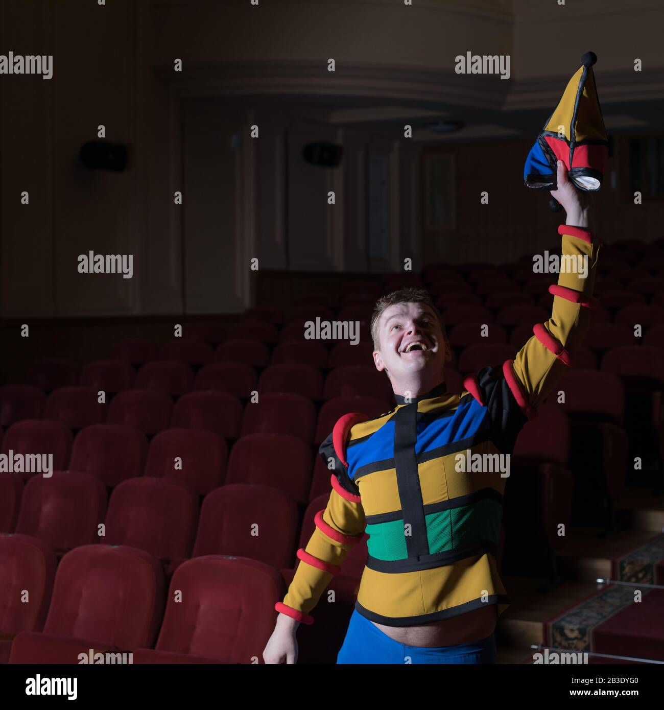 Actor dressed jester's costume in interior of old theater Stock Photo ...